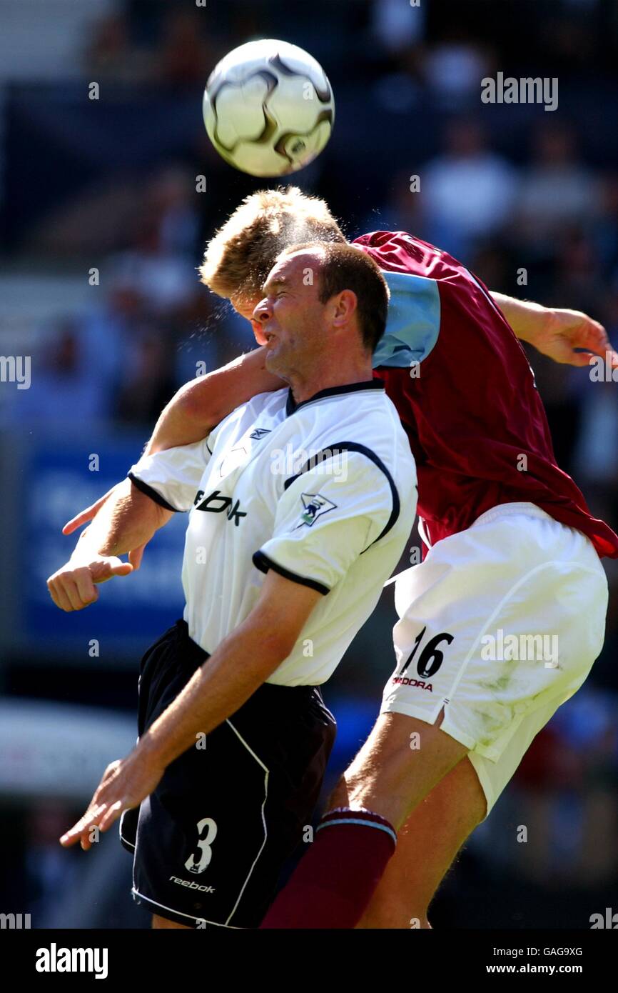 (L-R) Bolton Wanderers' Mike Whitlow battles for the ball in the air ...