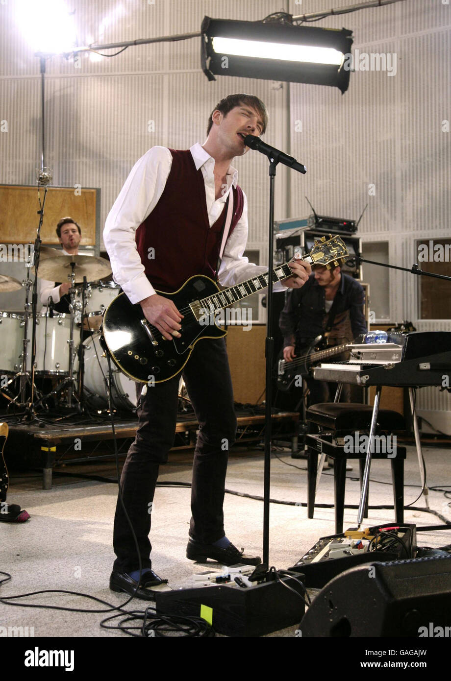 Dan Gillespie-Sells (front), lead singer of The Feeling during a ...