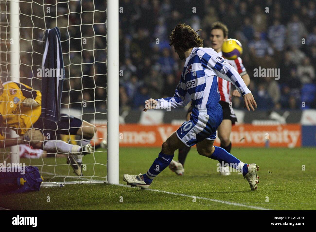 The ball bounces back off Sunderland goalkeeper Craig Gordon (left ...