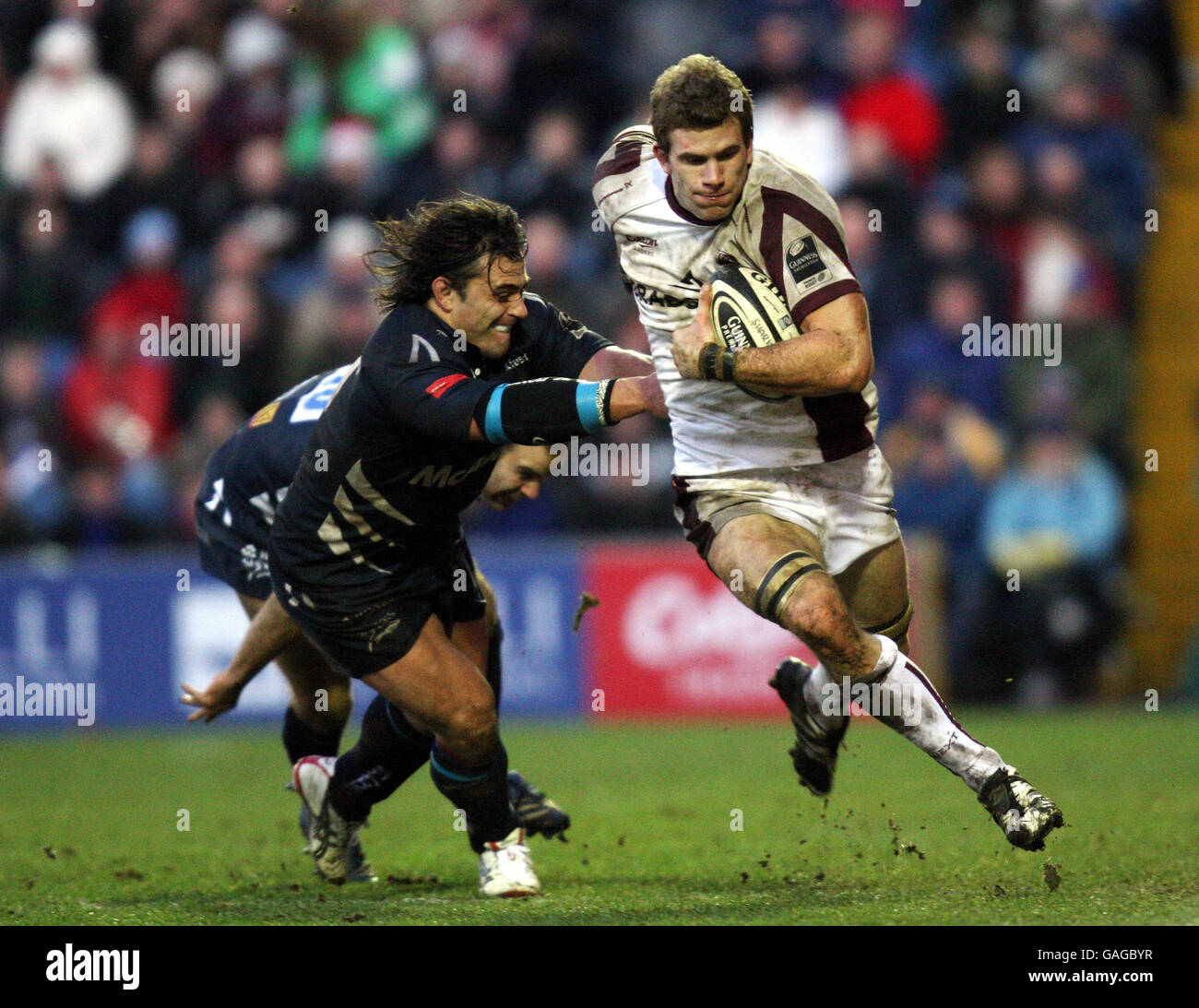 Leicester's Tom Croft gets away from Sale's Sebastien Bruno during the ...
