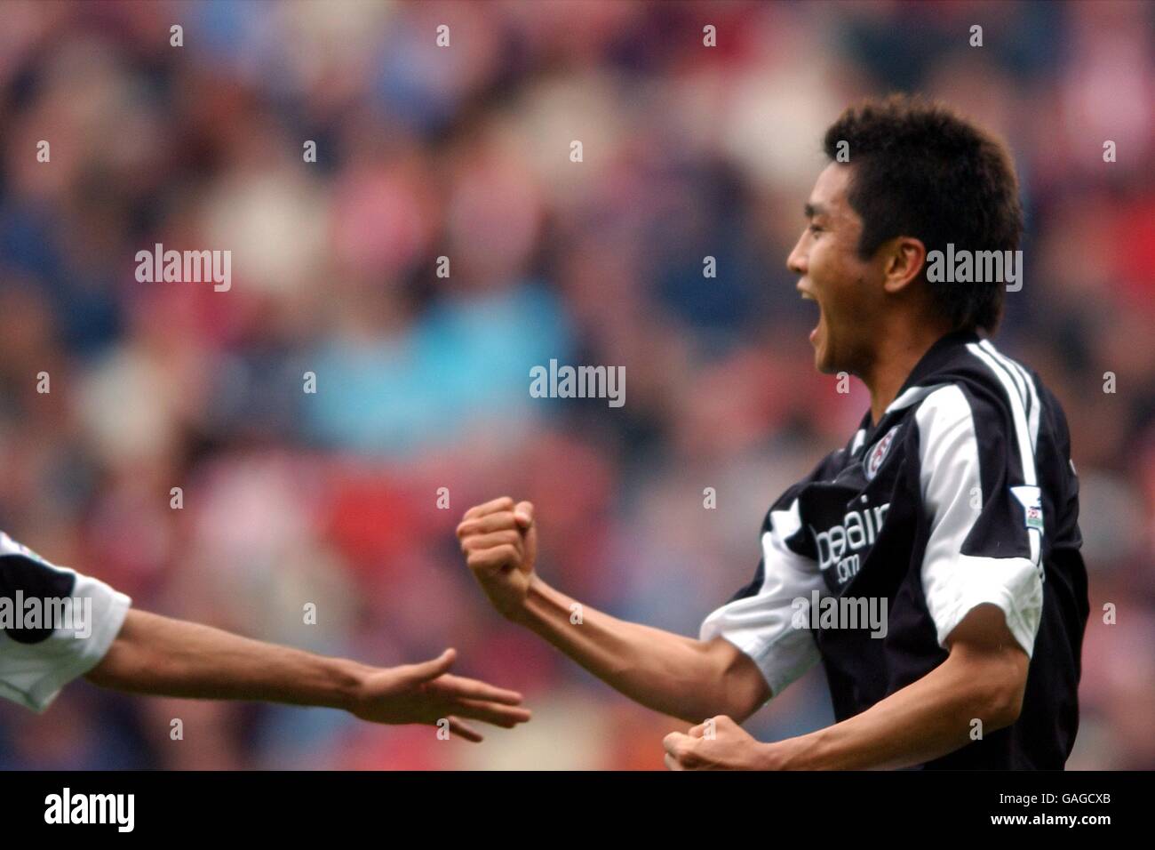 Fulham's Junichi Inamoto celebrates after scoring the opening goal ...