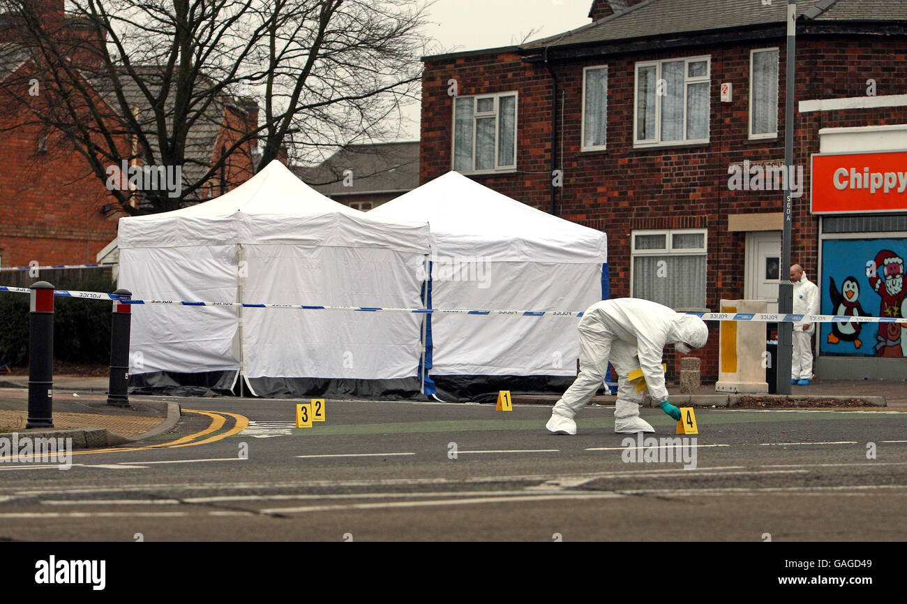 Three held in murder probe Stock Photo - Alamy