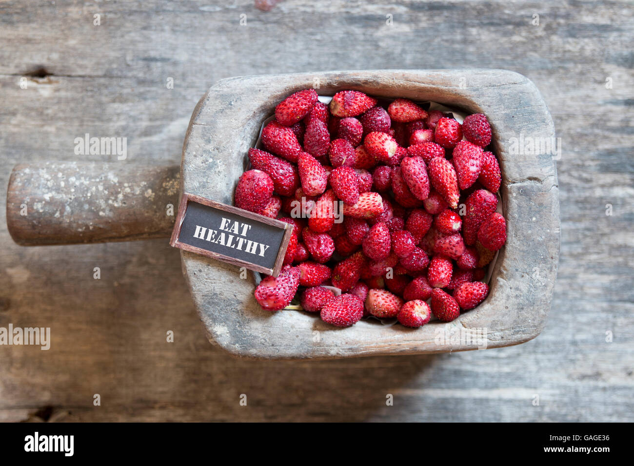 Eat healthy, strawberry and a tag Stock Photo - Alamy