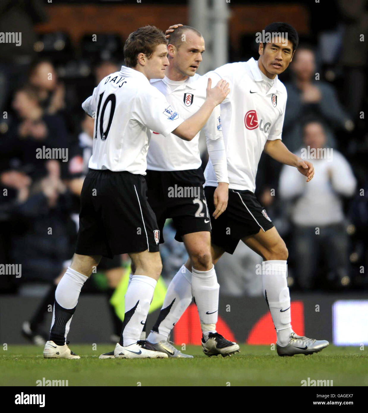 Fulham's Danny Murphy (centre) celebrates his goal during the FA Cup ...