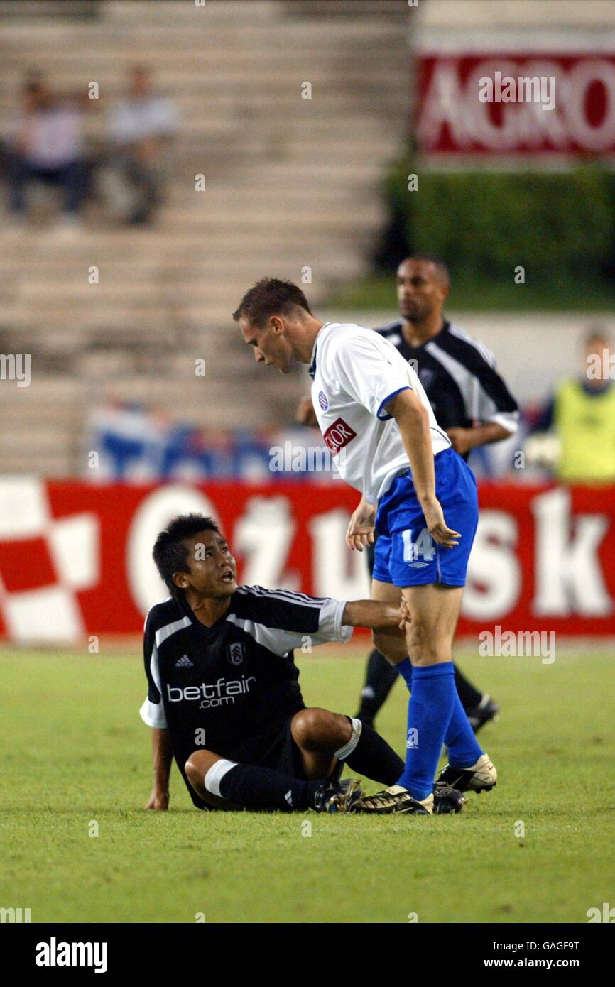 Hadjuk Split's Srdan Andric has words with Fulham's Junichi Inamoto ...
