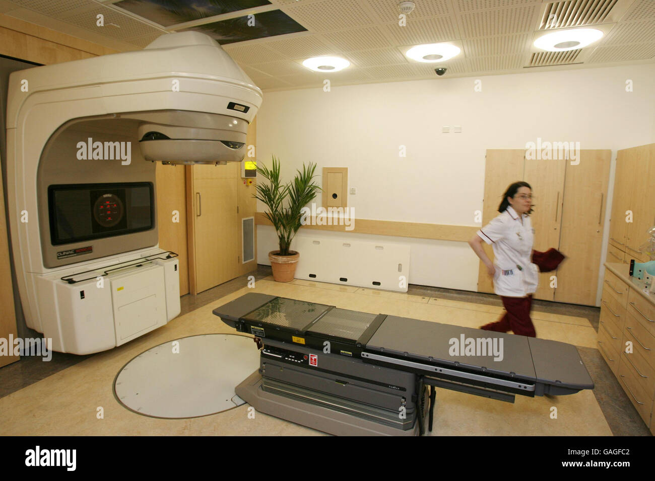 Hospital staff go about their work inside the radiotherapy department ...