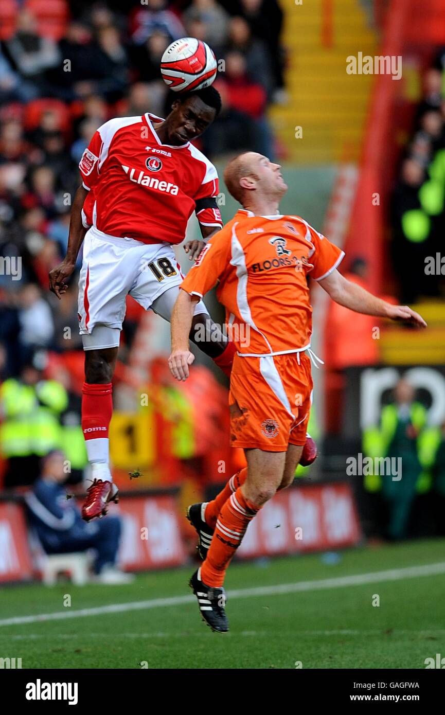 Charlton Athletic's Lloyd Sam beats Blackpool's Shaun Barker to the ...