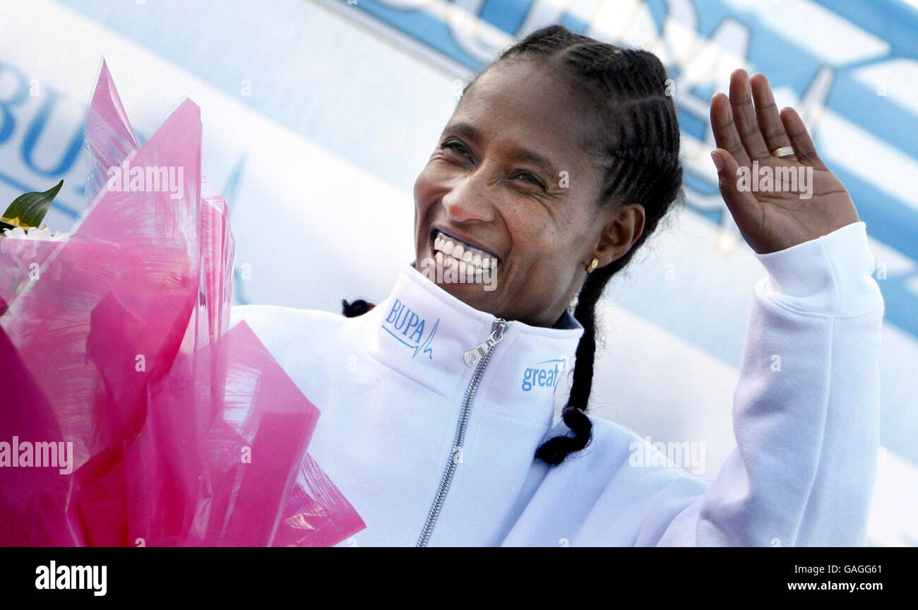 Ethiopia's Gelete Burka celebrates winning the Women's 6k, part of the ...