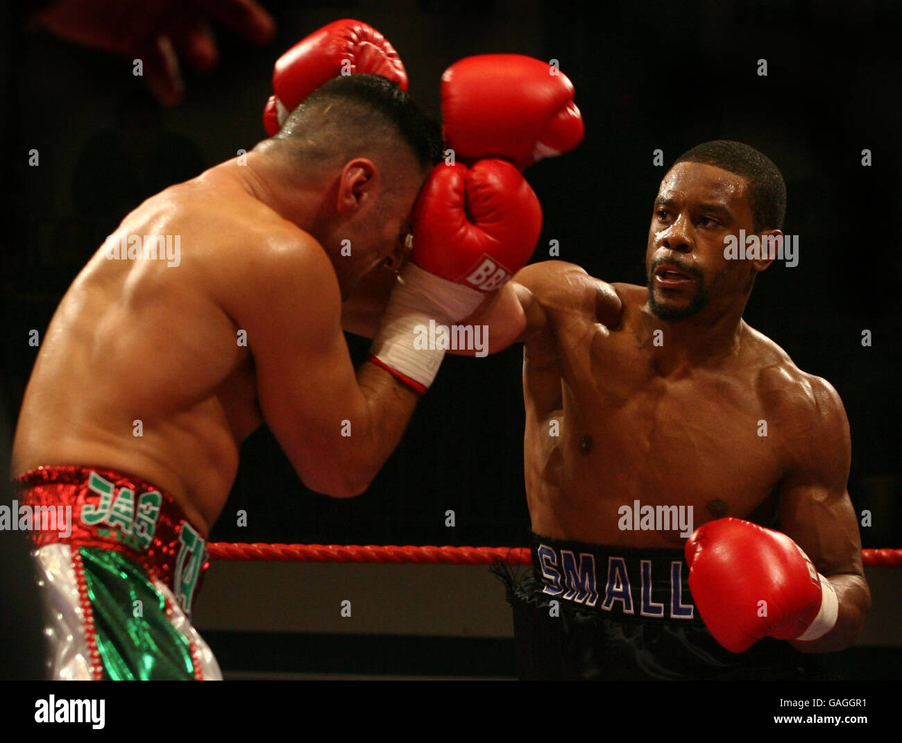 Half length mid top boxing gloves hi-res stock photography and images ...
