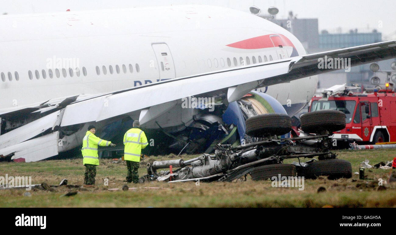 Workers examine british airways 777 that crashed heathrow hi-res stock ...