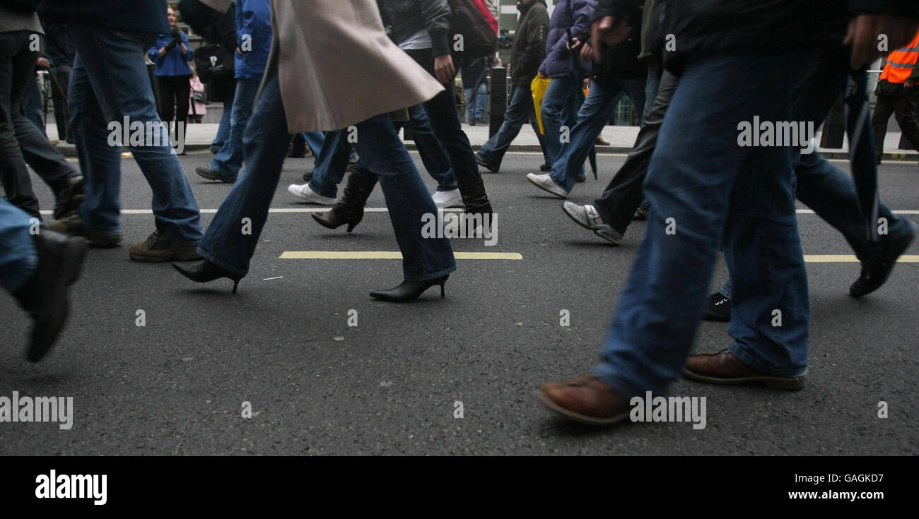 Thousands of police officers from across the UK march through central ...