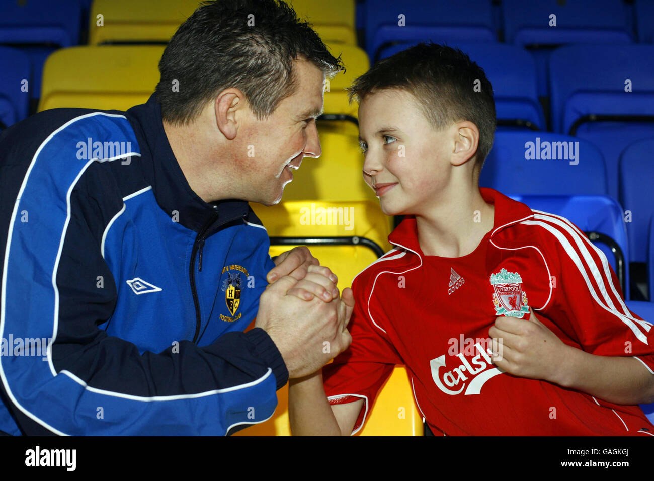 Liverpool fan Jake Gale squares up to his father Shaun, manager of ...