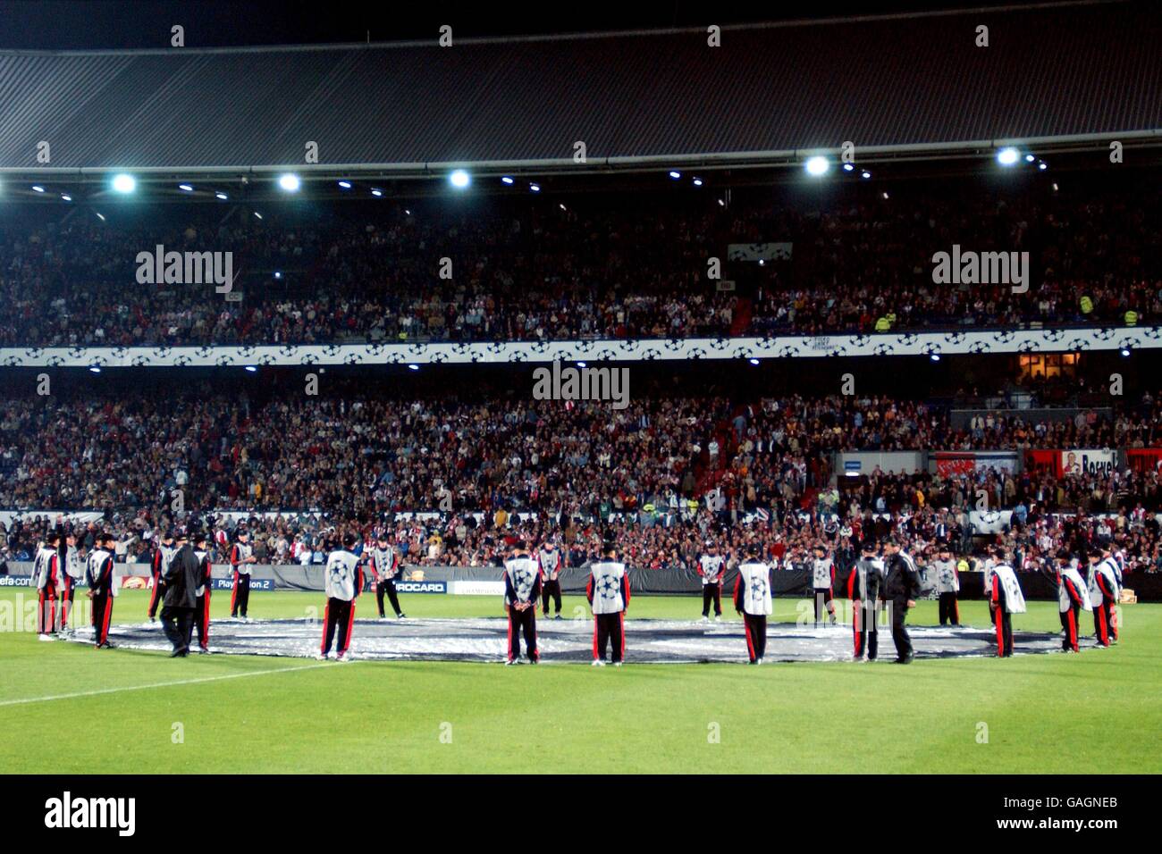 Champions league centre circle and ball boys hi-res stock photography ...