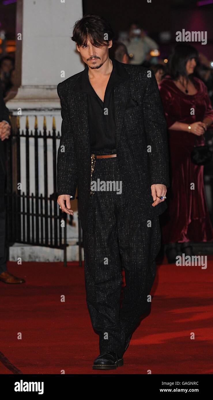 Johnny Depp arrives for the premiere of Sweeney Todd: The Demon Barber ...