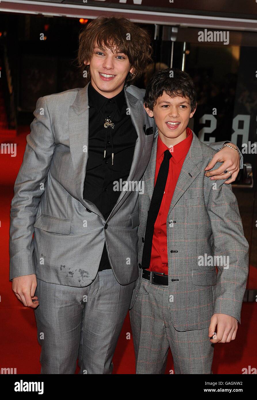 Jamie Campbell Bower (left) and Ed Sanders arrive for the premiere of Sweeney Todd: The Demon ...
