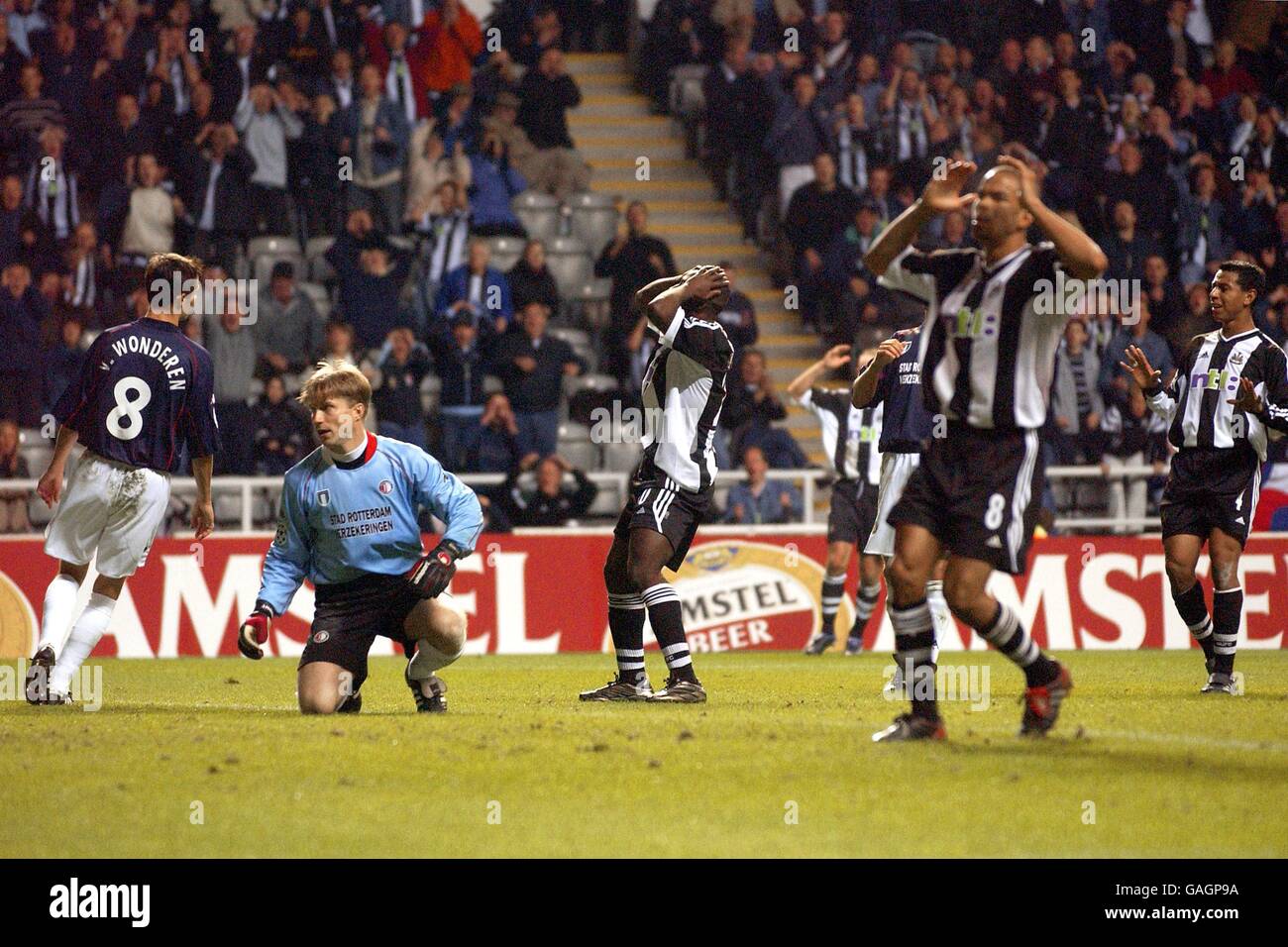 Newcastle players join striker Tresor LuaLua with his head in their ...