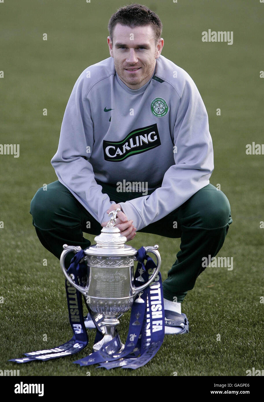 Celtic captain Stephen McManus with the Scottish Cup during a photocall ...