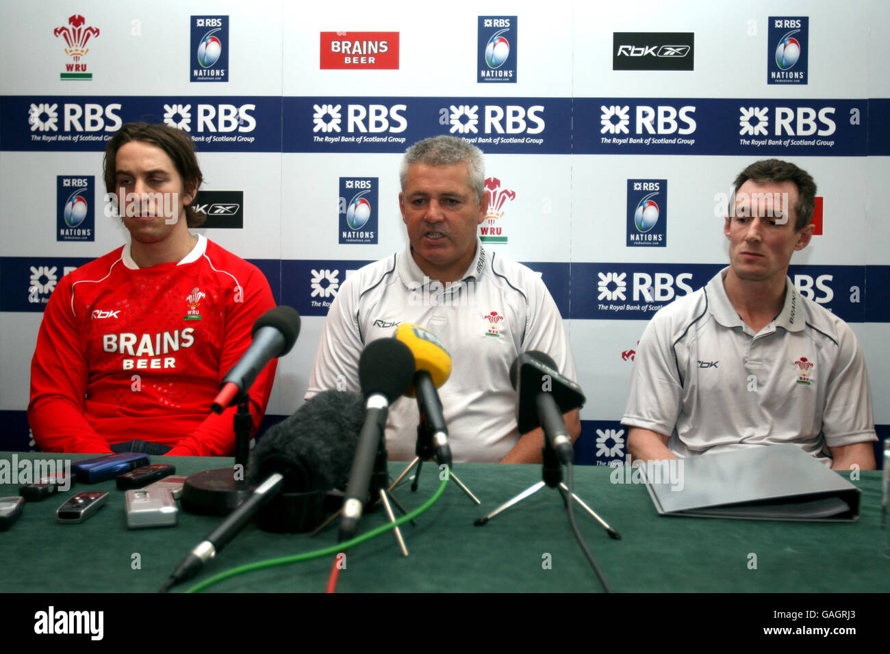 Wales coach Warren Gatland (c), new captain Ryan Jones (l) and backs ...