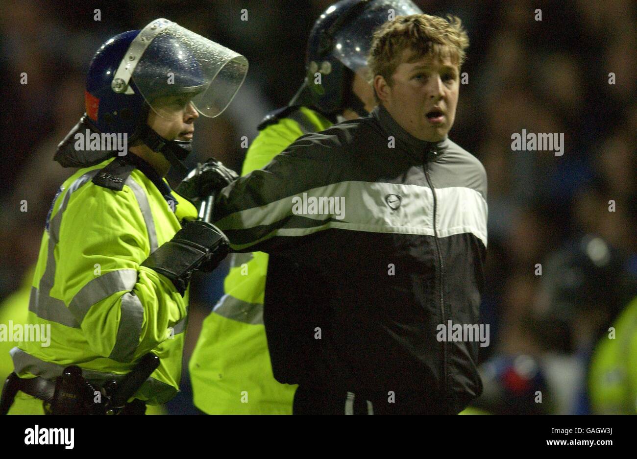 Storming the pitch hi-res stock photography and images - Alamy