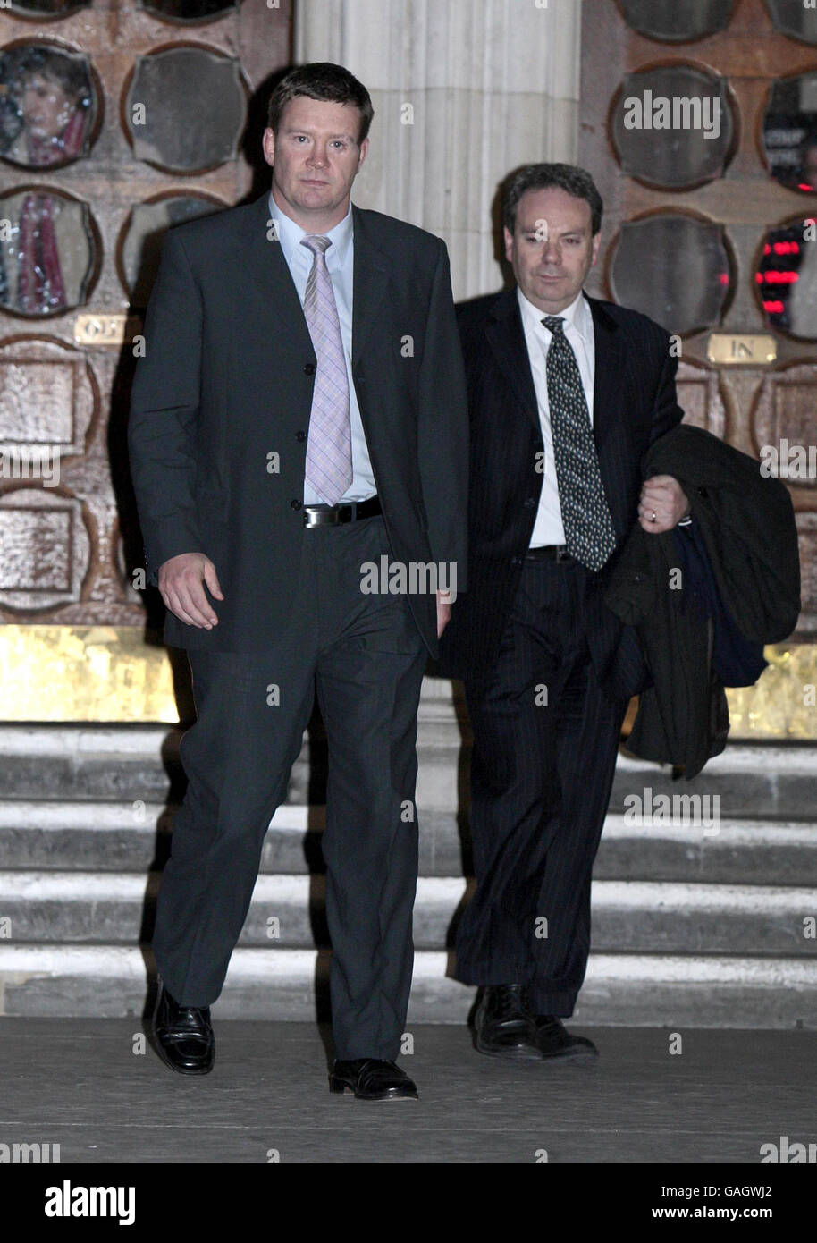 Trevor Rees (left) leaves after giving evidence at the inquest into the ...