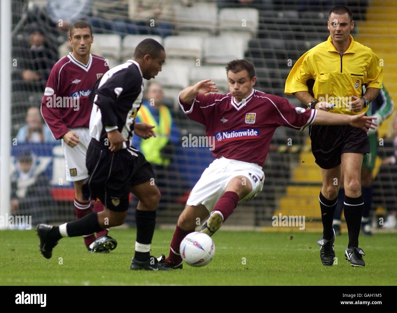 Notts County's Jeff Whitley and Northampton Town's Jamie Forrester ...