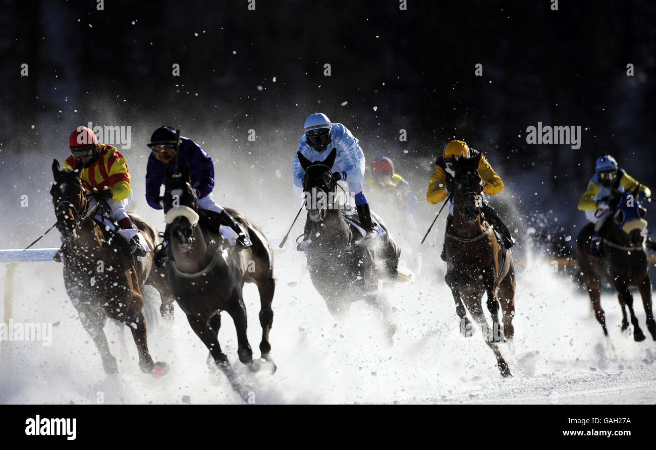 Runners riders compete on frozen lake st moritz hi-res stock ...