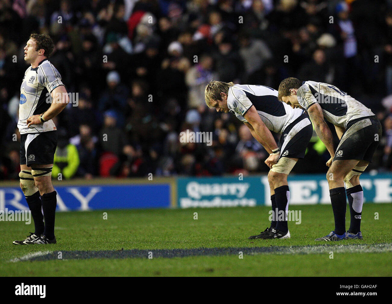 Scotland's Captain Jason White looks dejected with his team after their ...