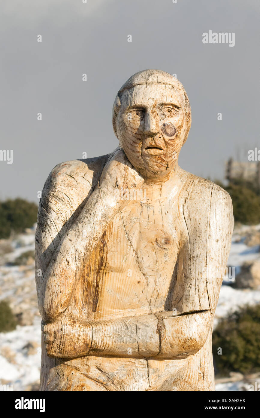 Athens, Greece 02 January 2016. Thinking man wood carving at the park ...