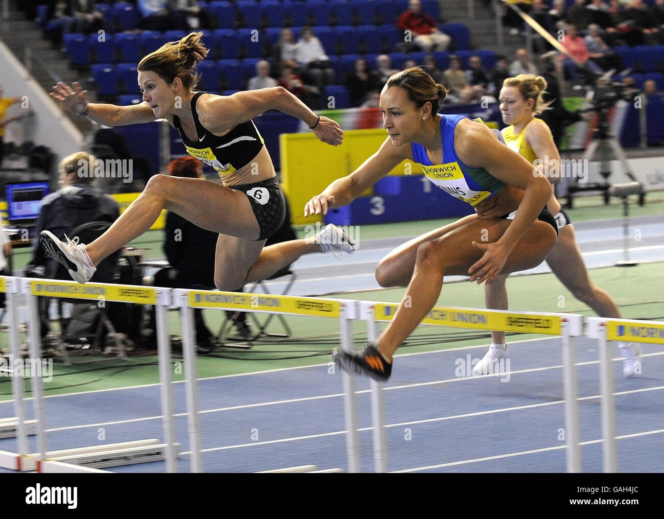 Jessica Ennis (right) and Kelly Sotherton jump the final hurdle in ...