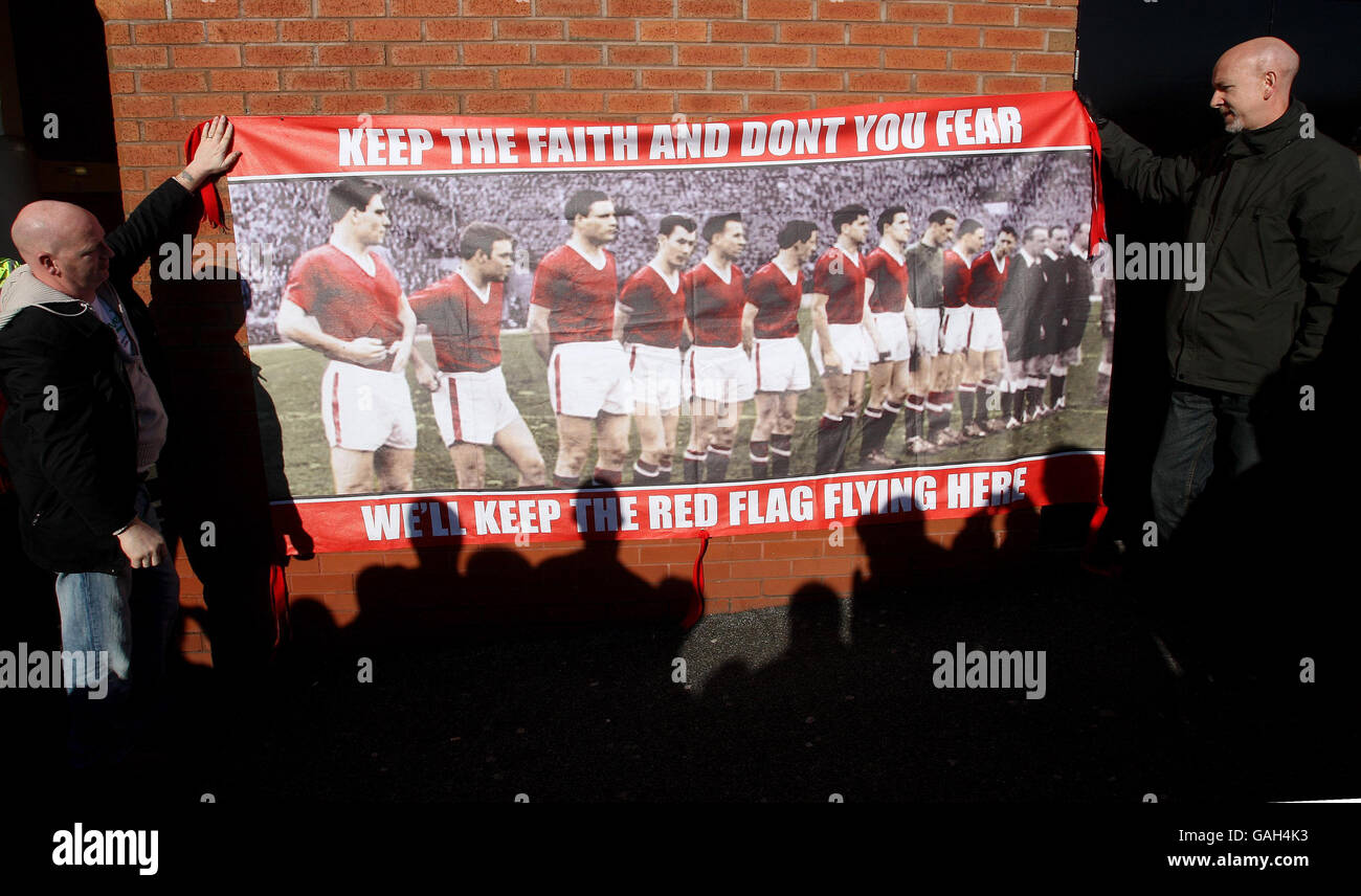 Manchester United fans hold a banner outside Old Trafford before the ...