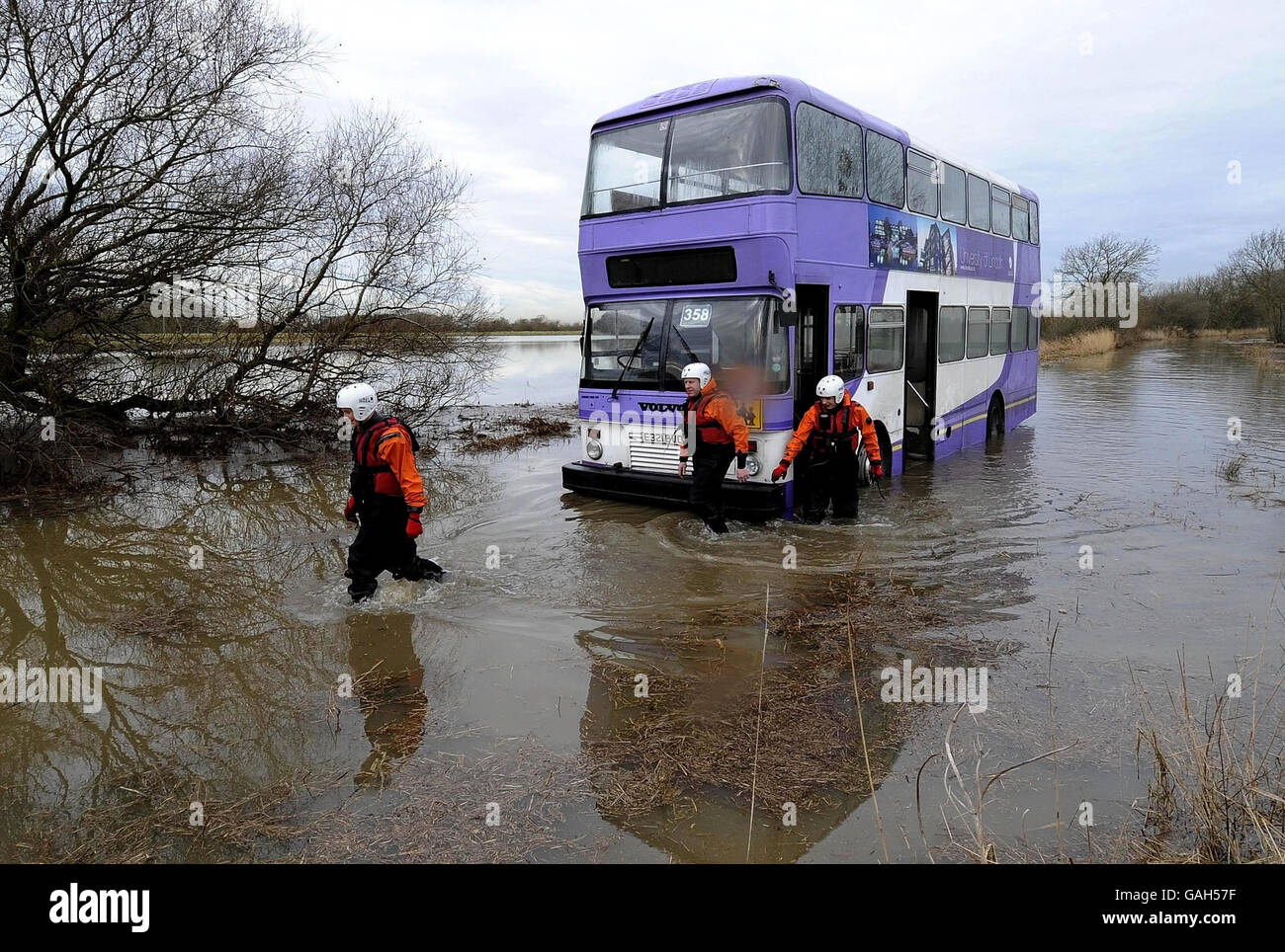 Fire and Rescue crews at the scene where a bus became trapped in floods ...