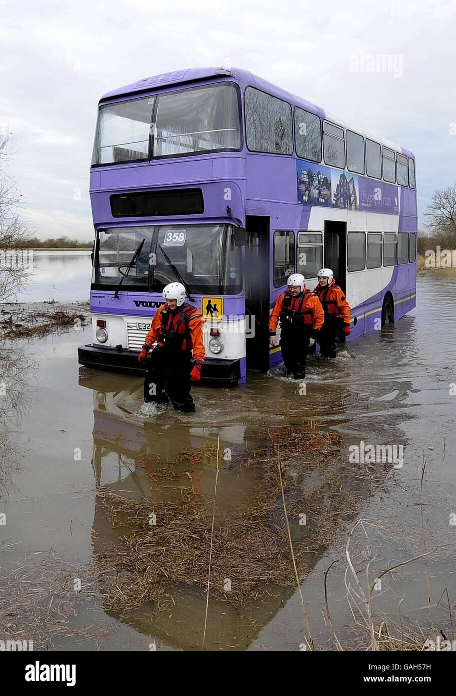 Fire and Rescue crews at the scene where a bus became trapped in floods ...