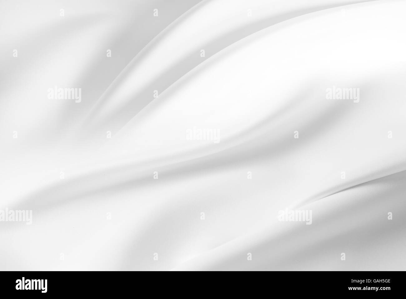 Closeup of rippled white silk fabric Stock Photo - Alamy