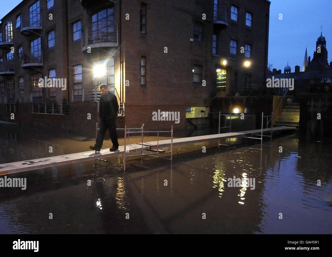 Walking In A Flooded Street High Resolution Stock Photography and ...