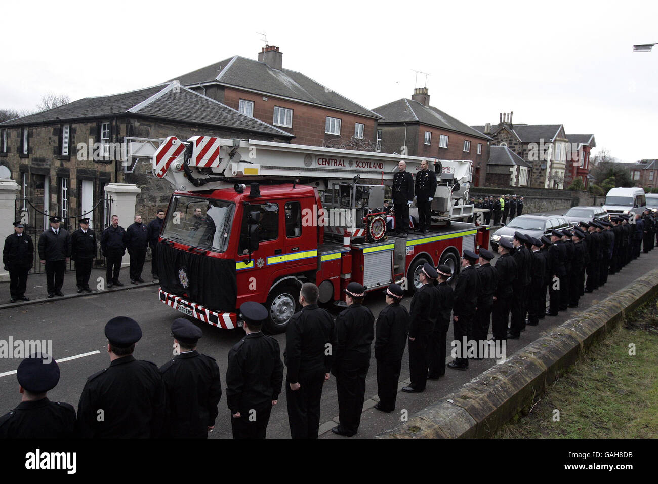 Firemen line the street as the coffin of road crash fireman John Noble ...