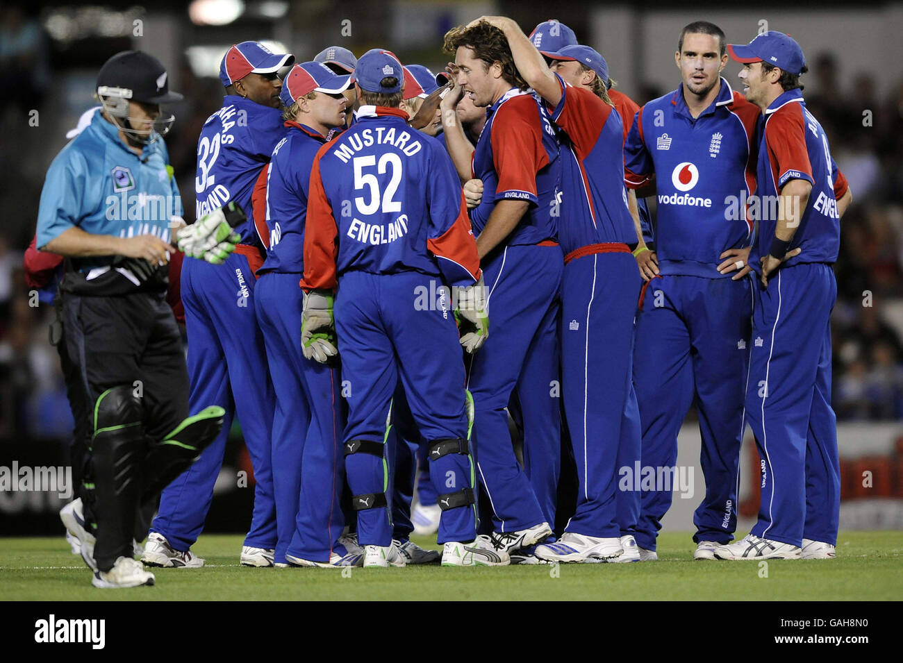 England's Ryan Sidebottom celebrates taking the wicket of New Zealand's ...
