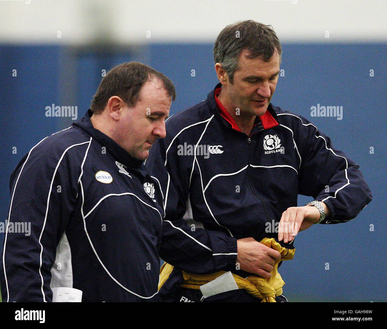 Scotland's Coach Frank Hadden looks at the time as he talks to ...