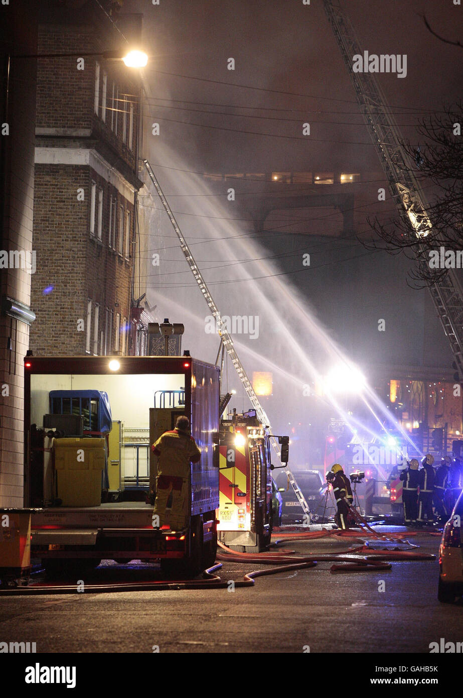 Major fire consumes famous market. Firemen tackle the blaze at the ...