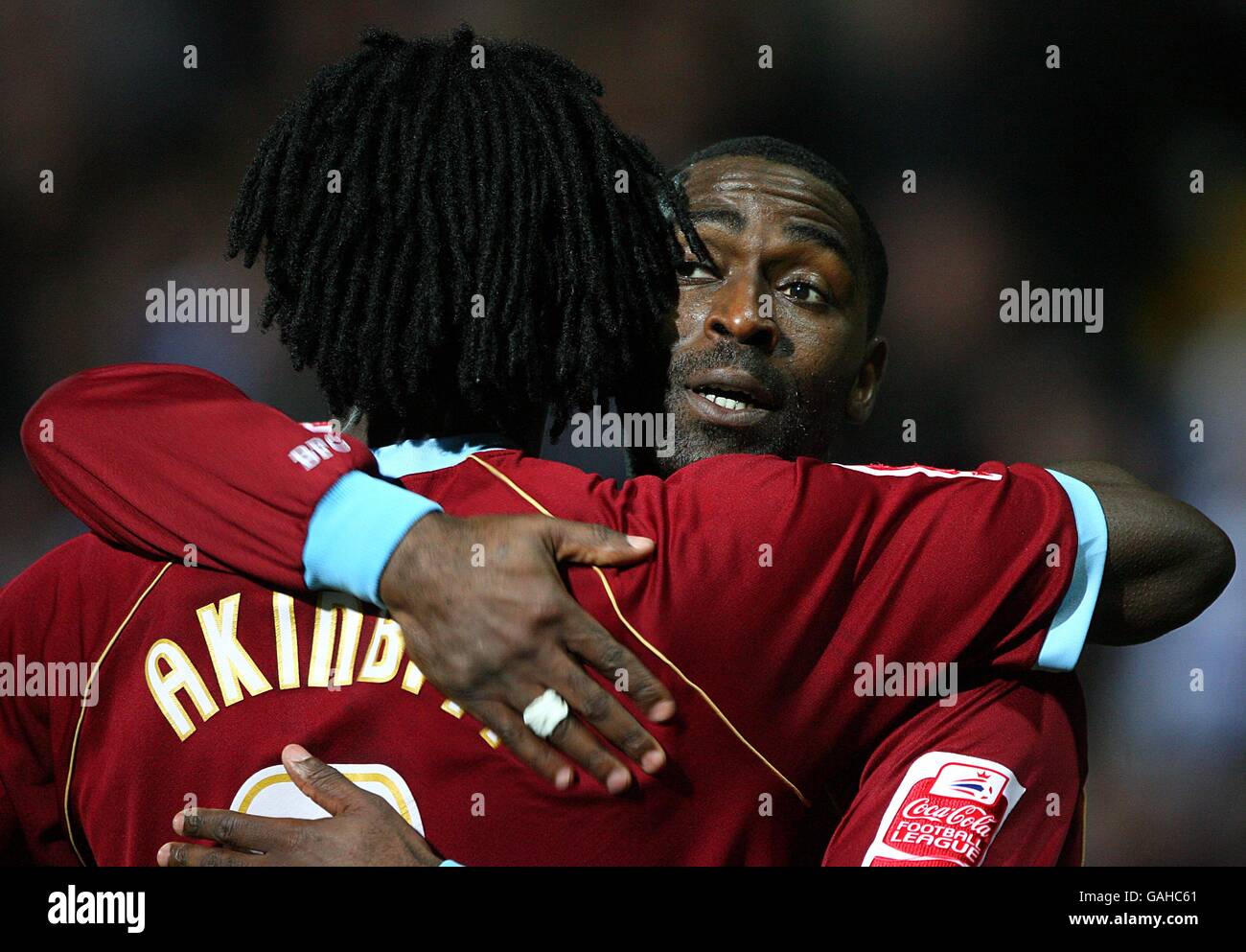 Burnley's Andrew Cole (right) celebrates with team mate Ade Akinbiyi ...
