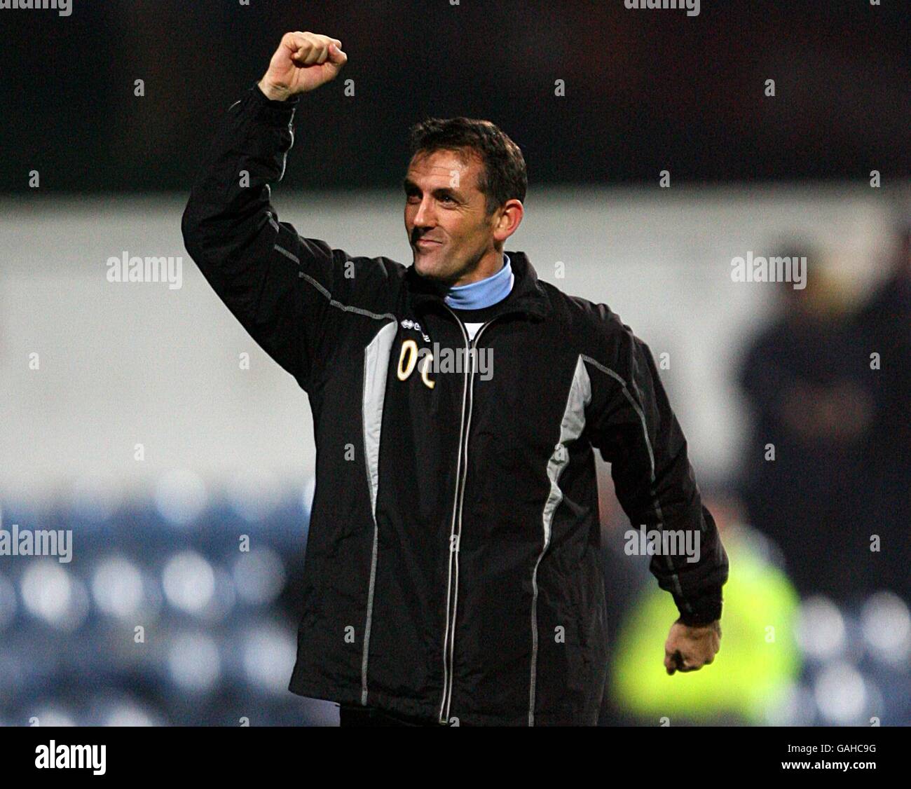 Bunrley manager Owen Coyle celebrates victory after the final whistle ...