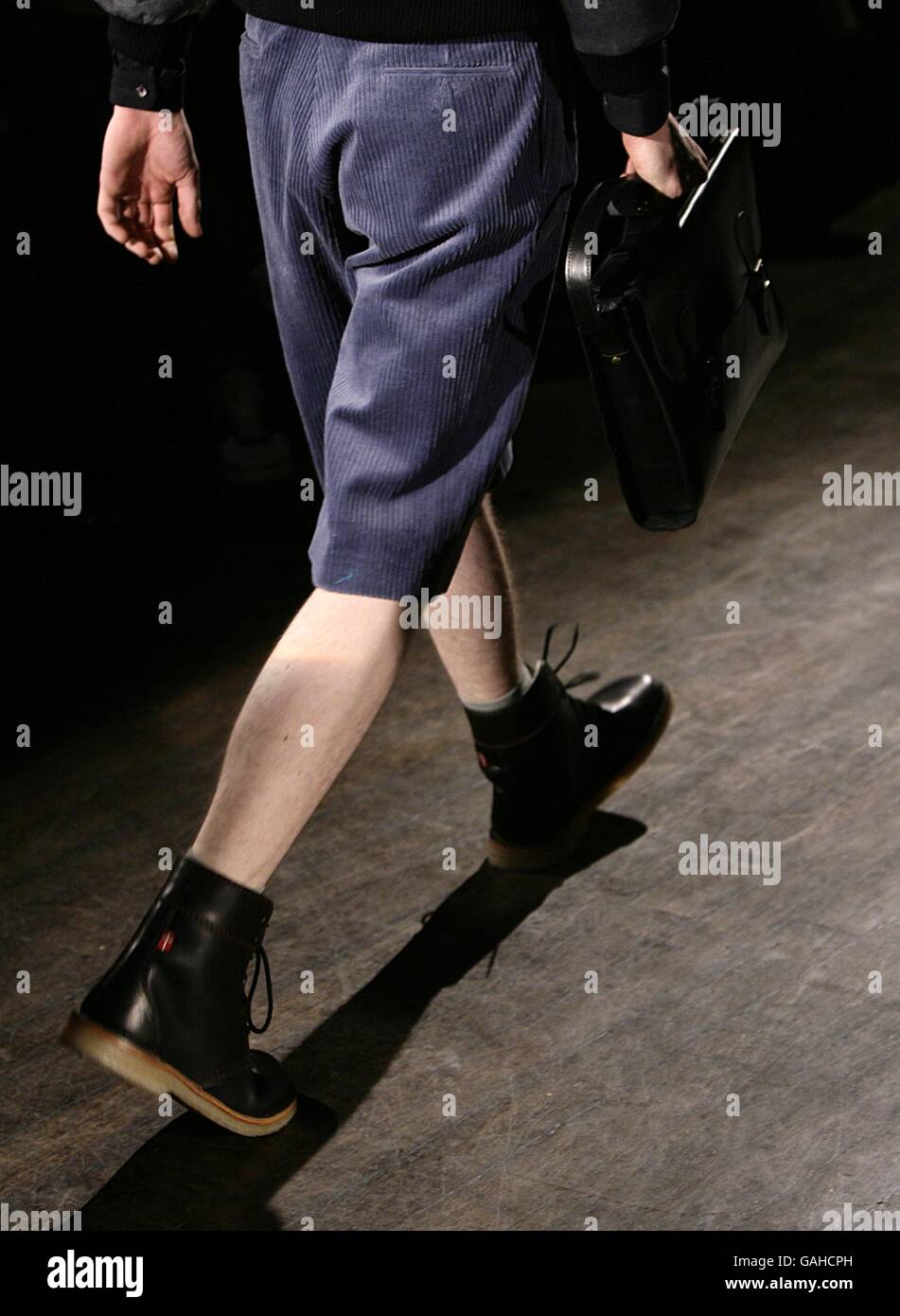 A model wears a creation by designer Peter Jensen, during London ...