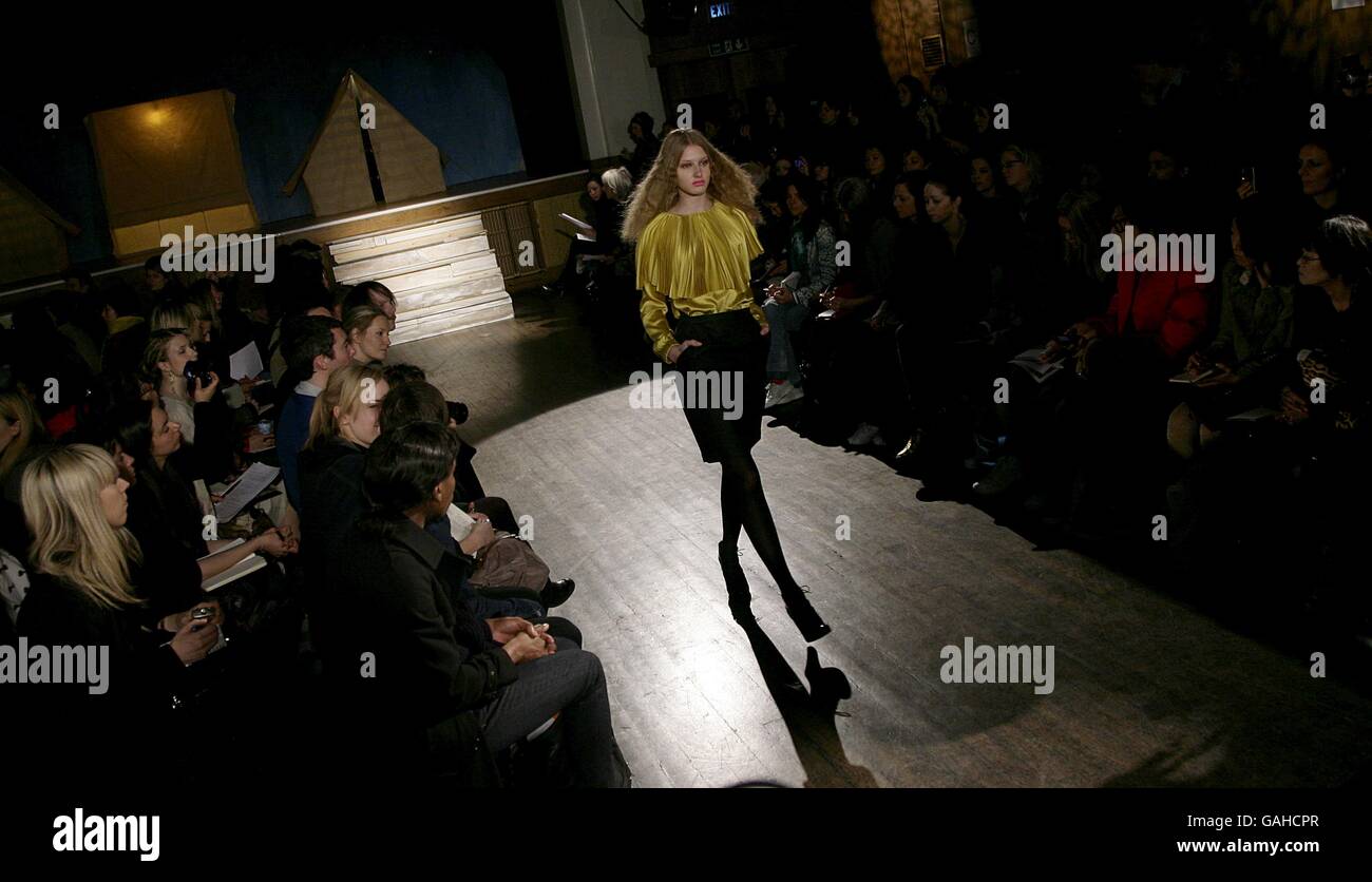 A model wears a creation by designer Peter Jensen, during London ...