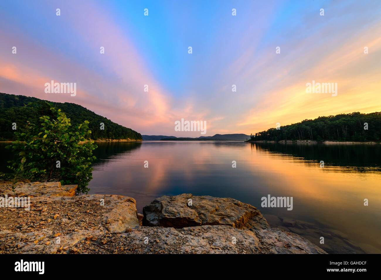 An amazingly colorful sunset over Cave Run Lake in the Daniel Boone ...