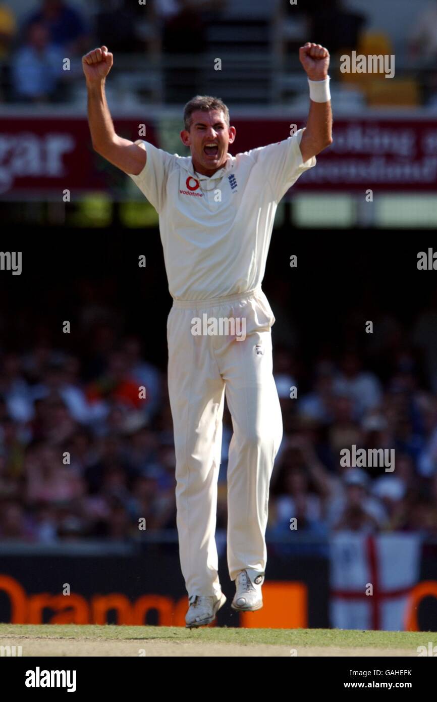 England's Andrew Caddick celebrates the wicket of Australia Michael ...