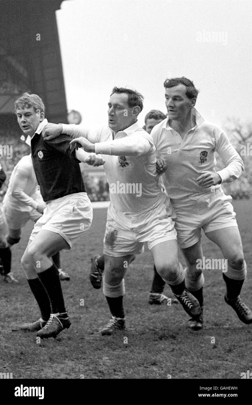 England's Ron Jacobs (c) and Ernie Robinson (r) in action Stock Photo ...