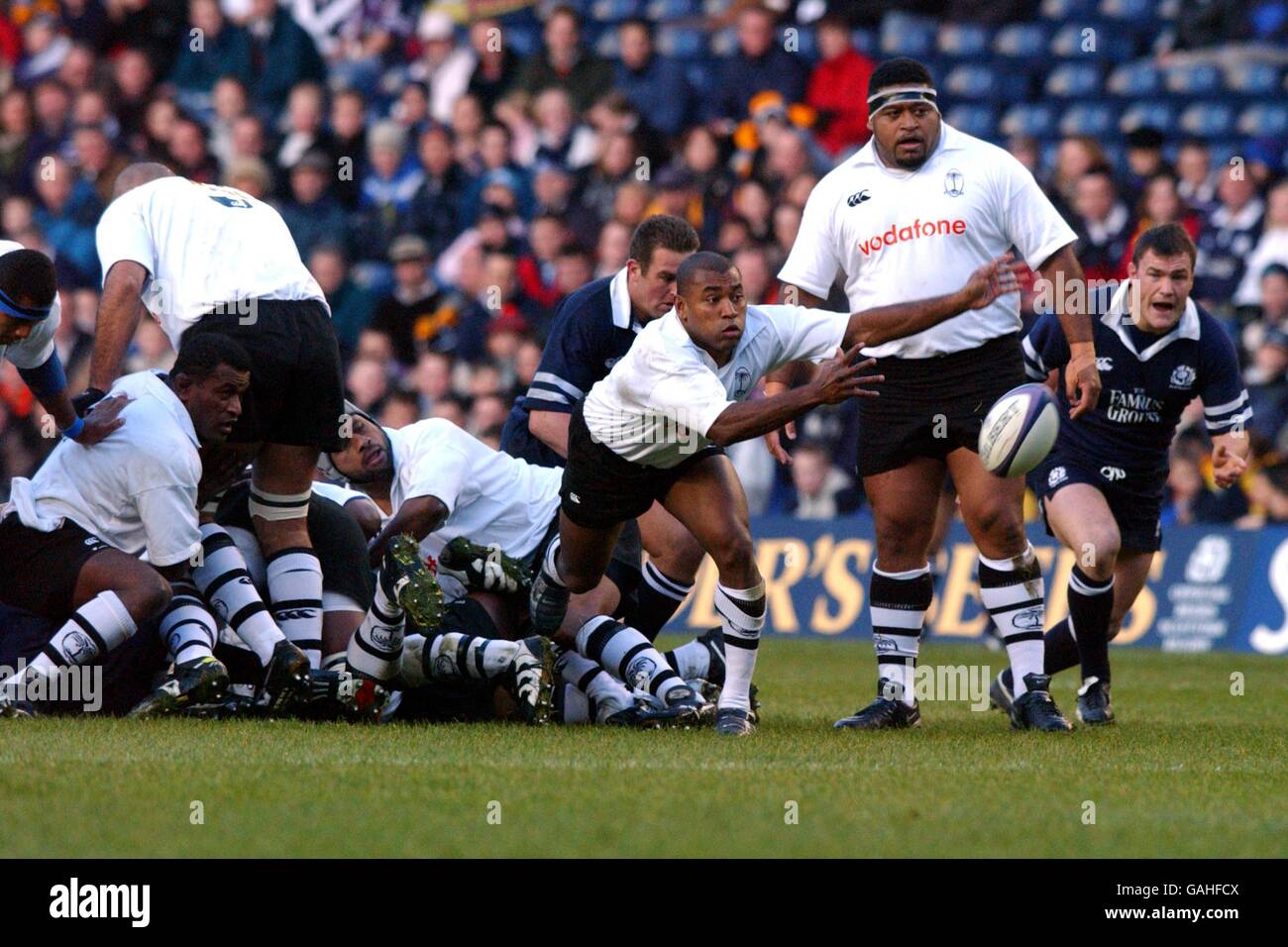 Fijis jacob rauluni passes the ball out from the scrum hi-res stock ...