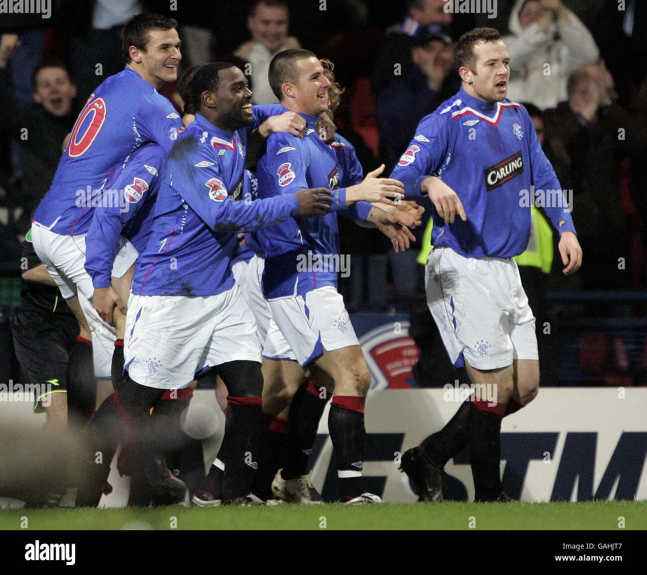 Glasgow rangers players celebrate goal hi-res stock photography and ...