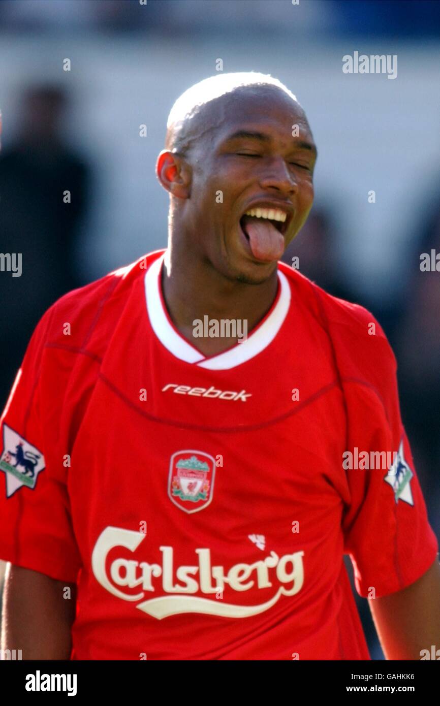 Liverpools el hadji diof sticks his tongue out hi-res stock photography ...