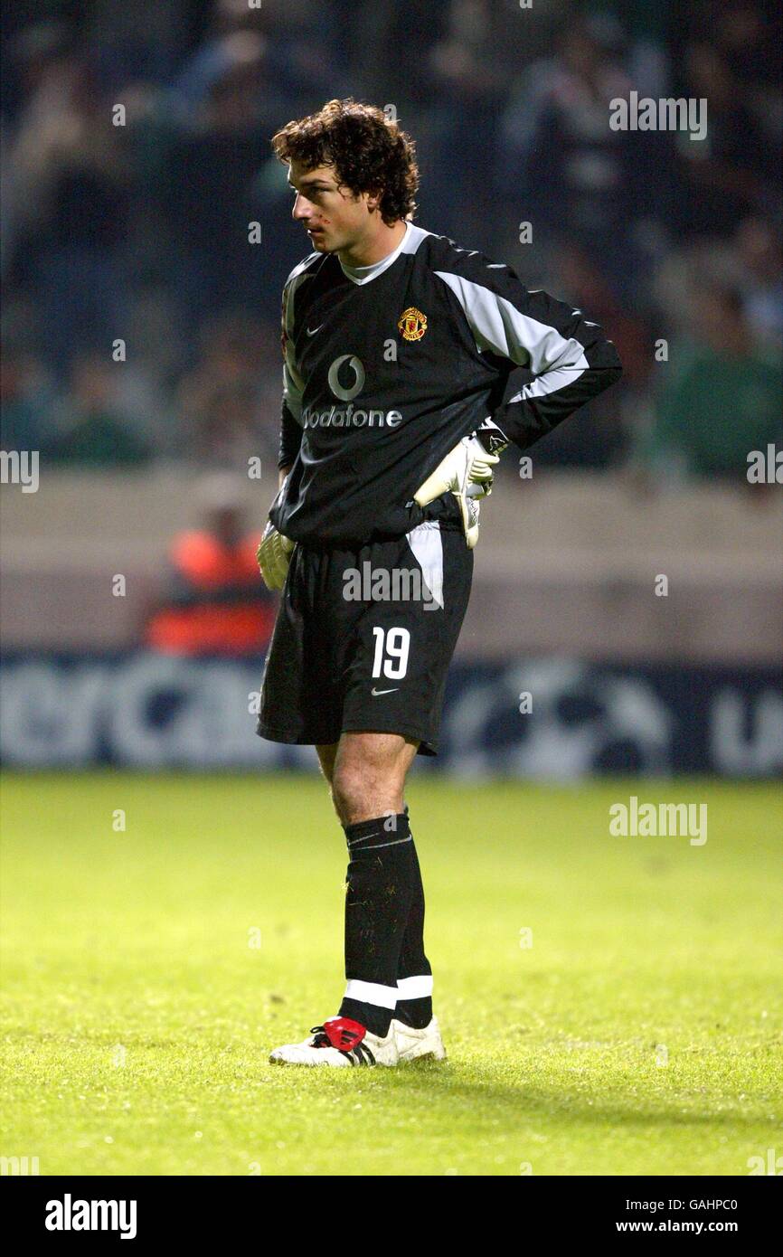 Manchester United's keeper Ricardo stands dejected after his debut ...