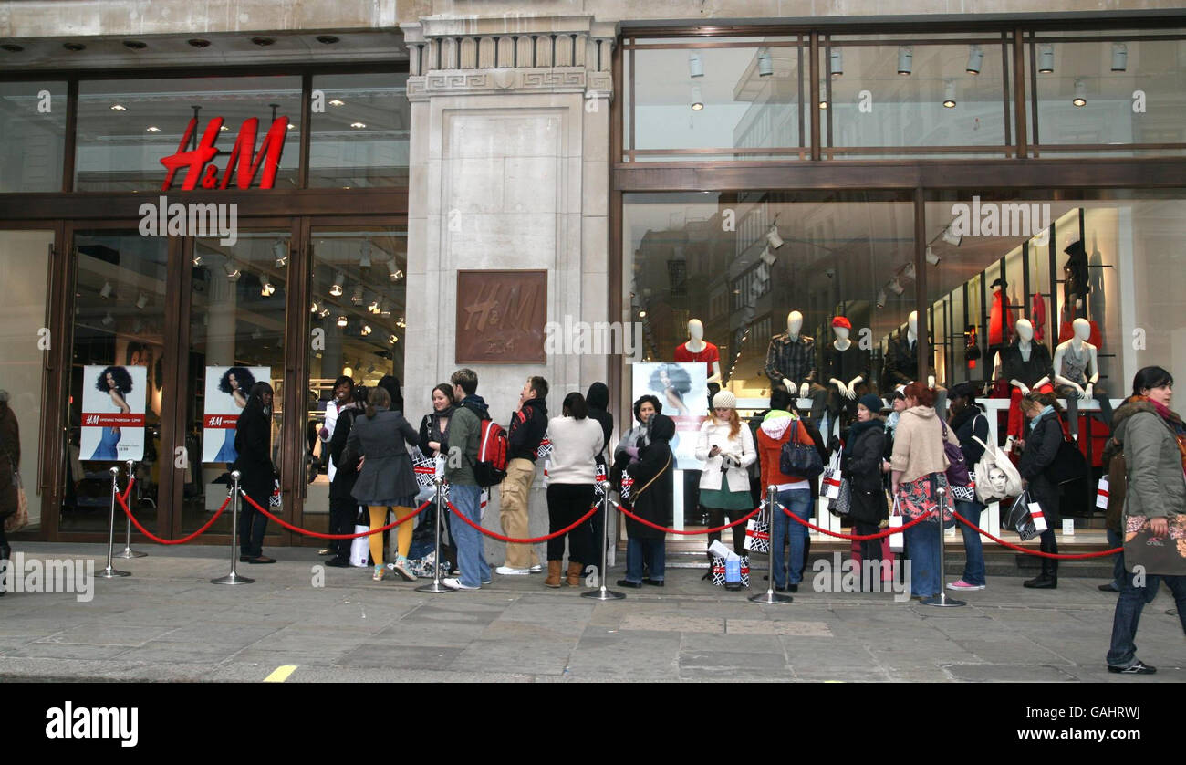 Flagship H and M London store opens. Queues outside the new H&M ...